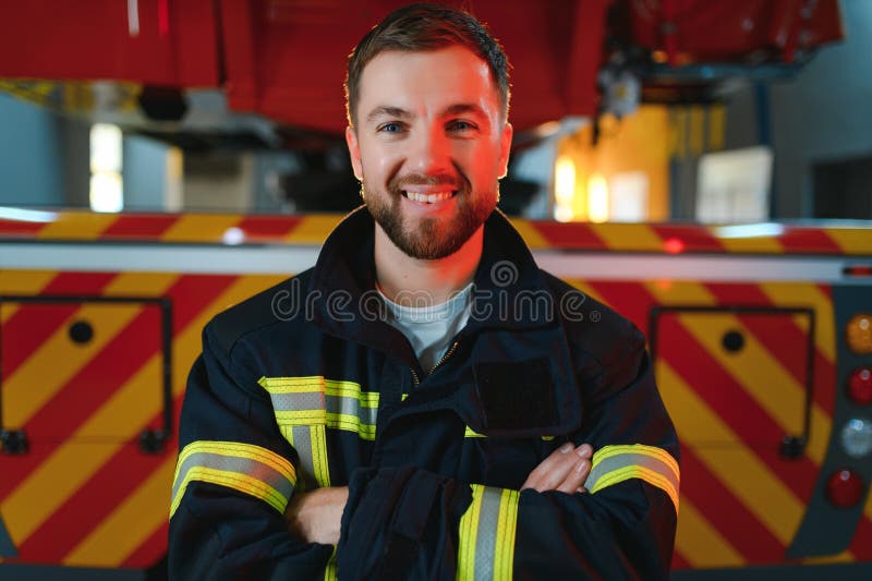 Firefighter in Uniform and Helmet Near Fire Engine Stock Image - Image ...
