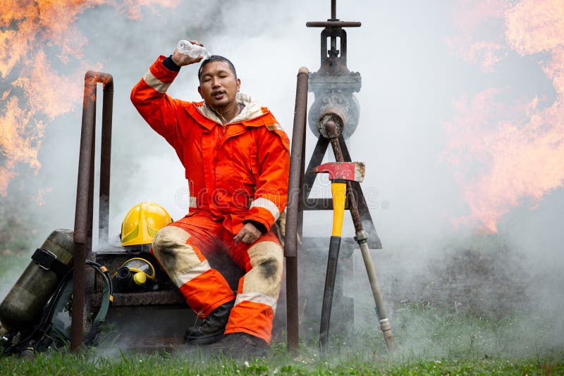 Firefighter Using Drinking Pour Water Stock Image - Image of confident ...