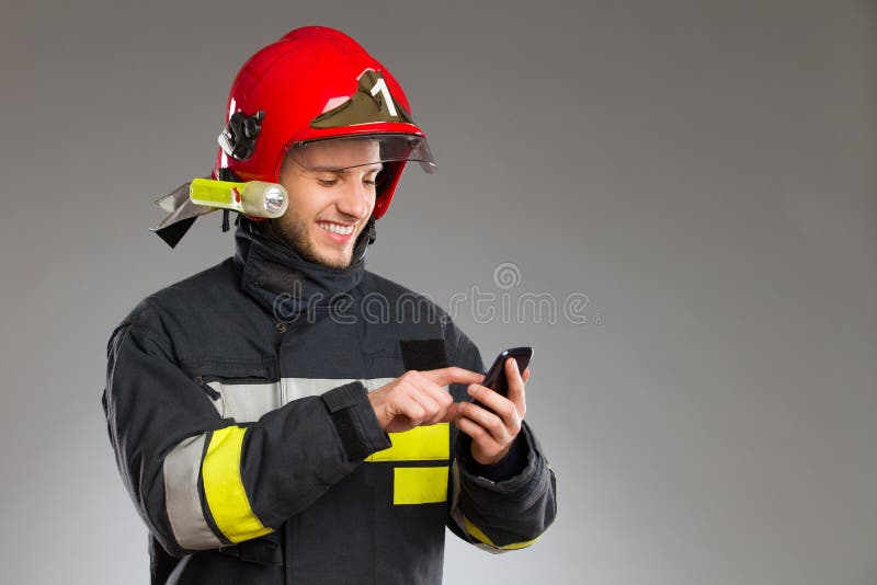 Fireman using phone. stock image. Image of people, cutout - 38622679