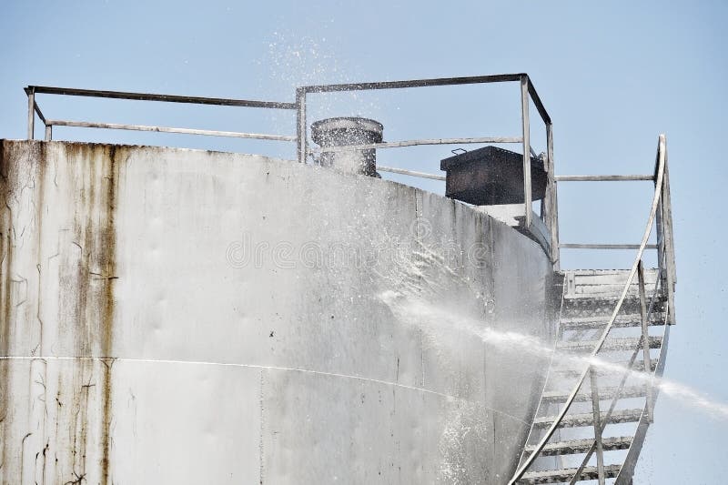 Firefighter Water Jet Extinguish Storage Tank Stock Photo - Image of ...