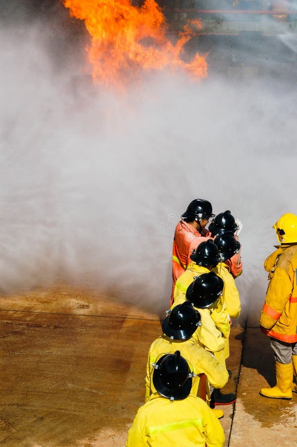 Firefighter editorial stock photo. Image of stream, yellow - 40860638