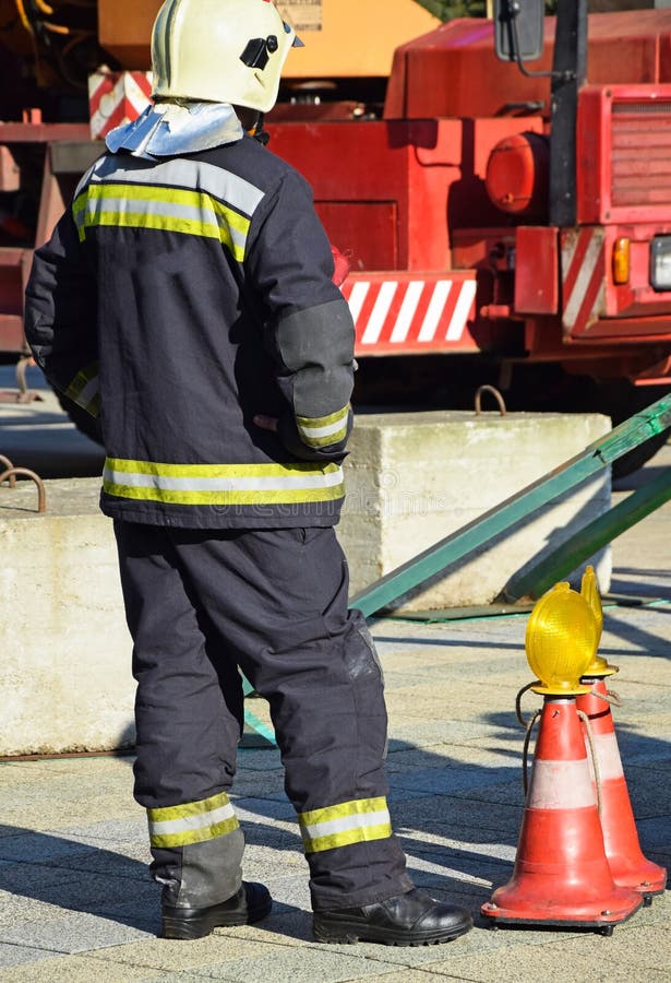 Firefighter at work stock image. Image of cone, engine - 59515857