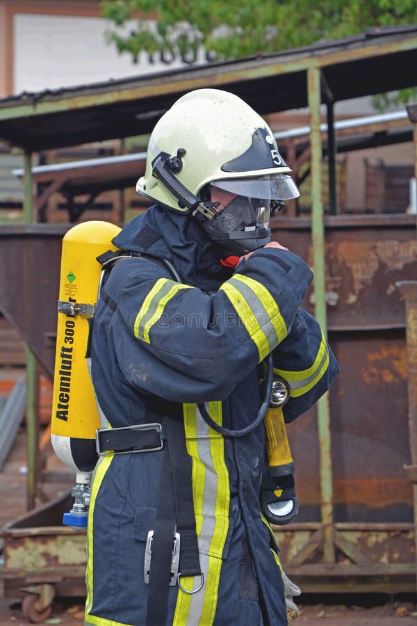 Firefighter at work stock image. Image of looking, burn - 32324229