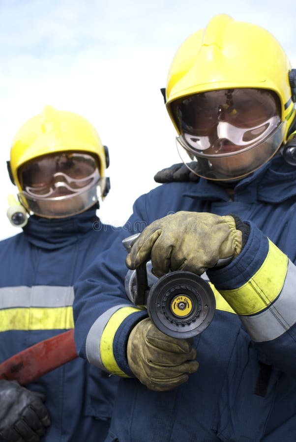 Fire Fighter on Oil and Gas Industry, Successful Firefighter at Work ...