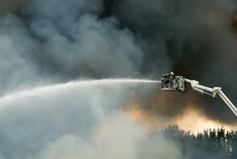 Firefighters in action stock image. Image of global, crane - 6433311