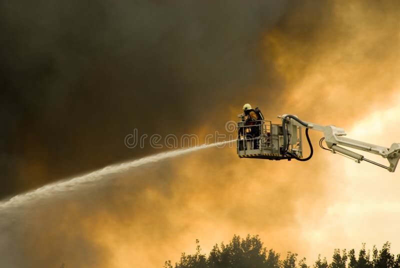 Firefighters in action stock image. Image of firefighter - 19572393