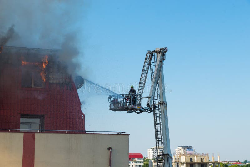 Firefighters in action stock photo. Image of house, group - 14560174