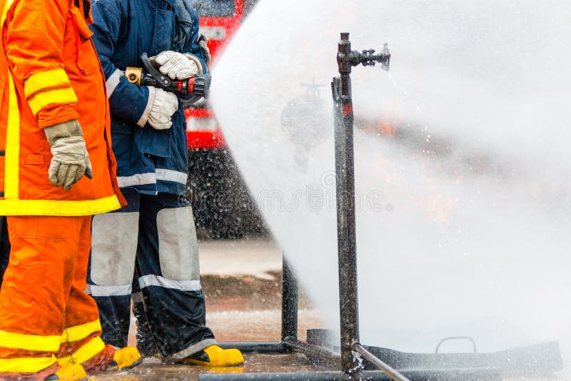 Firefighters training stock photo. Image of danger, fighting - 100779690