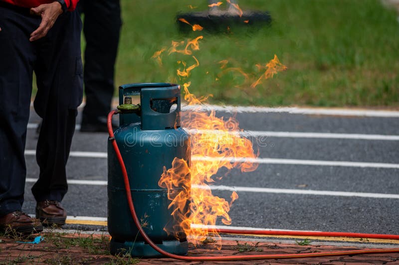 Fire demonstration stock image. Image of extinguisher - 245808961