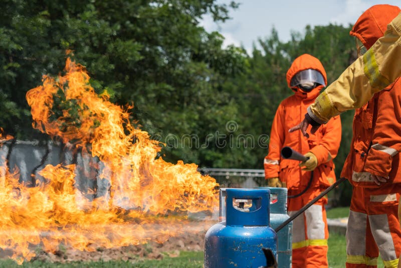 Fire demonstration stock image. Image of extinguisher - 245727133