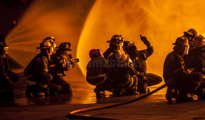 Firefighters Discussing How To Fight Fire Editorial Photo - Image of ...