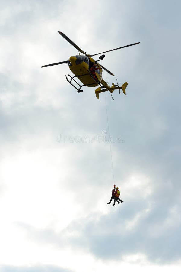 Firefighters Evacuating a Casualty by Helicopter during a Training ...