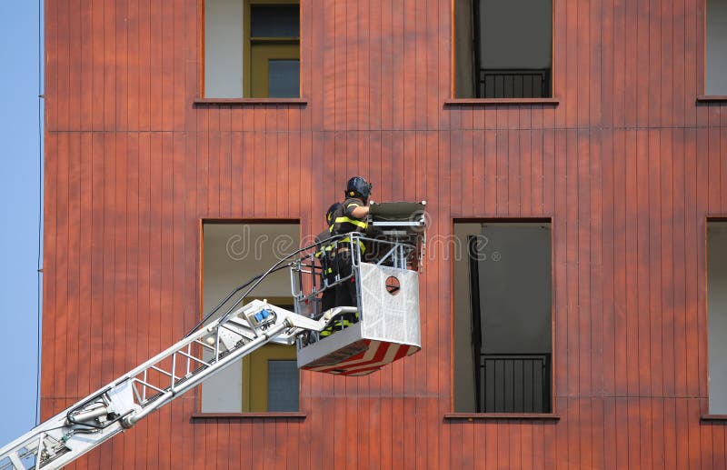 Firefighters during Exercise in the Firehouse and the Building Stock ...