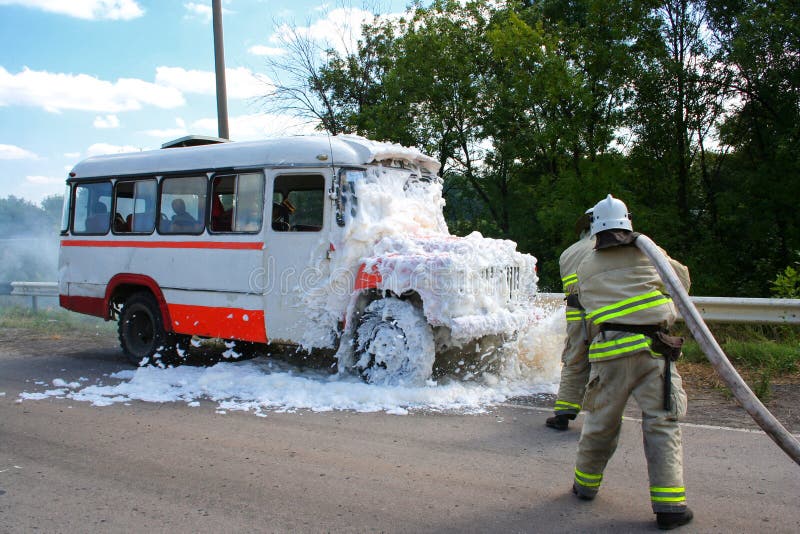 Firefighters Extinguish a Burning Bus Stock Photo - Image of chemist ...