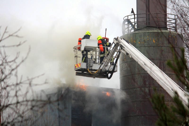 Fire and Rescue Firefighters Combating a Building Fire Editorial Stock ...