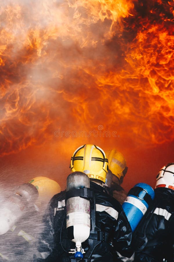 Firefighters fighting fire stock photo. Image of heroism - 102149552
