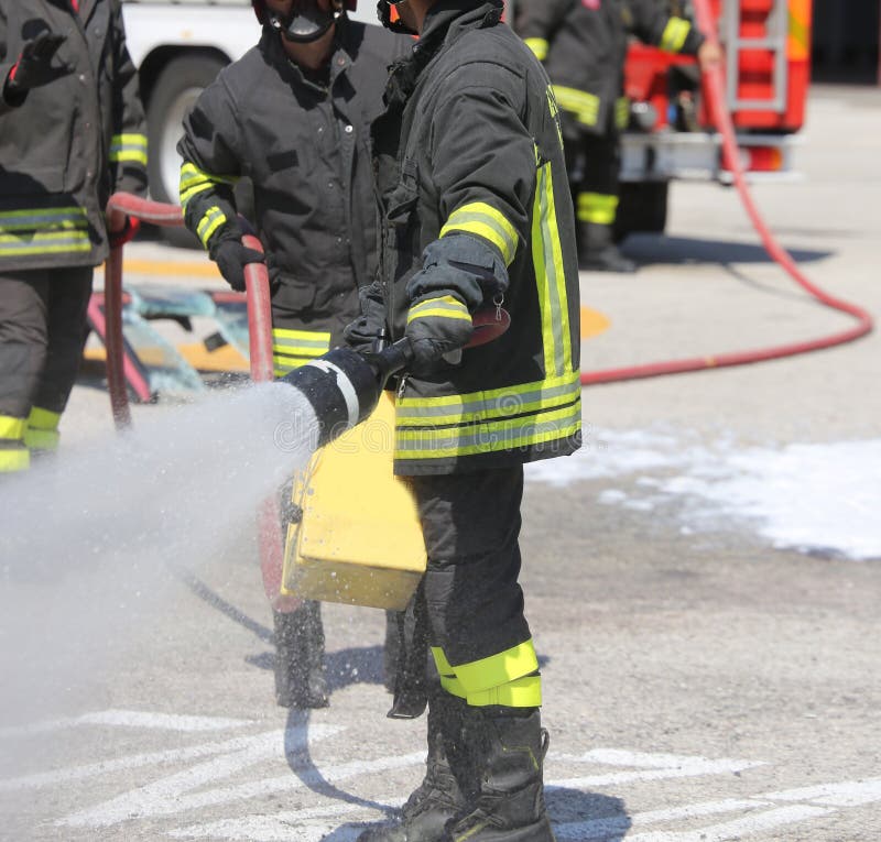 Firefighters with the Fire Extinguisher during a Practice Session at ...