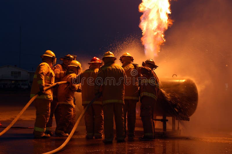 Firefighters and flames stock image. Image of control - 13379317