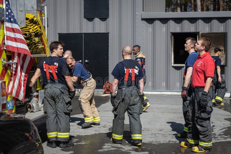 Firefighters in Gear with Fire Engine Editorial Stock Image - Image of ...