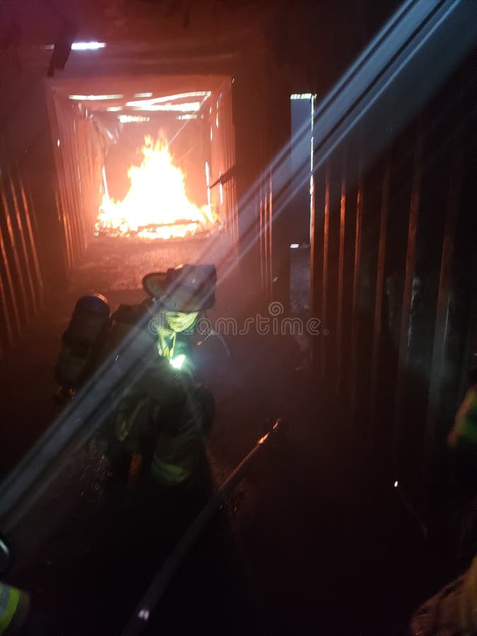 Firefighters hard at work stock photo. Image of games - 216969362