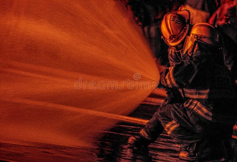 Firemen attacking a fire stock image. Image of alone - 15416129