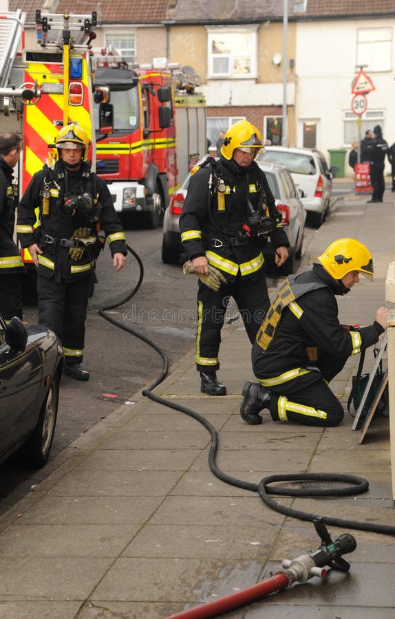 Firefighters at house fire editorial stock image. Image of breathing ...