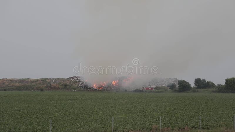 Firefighters landfill site stock video. Video of dumping - 264141901