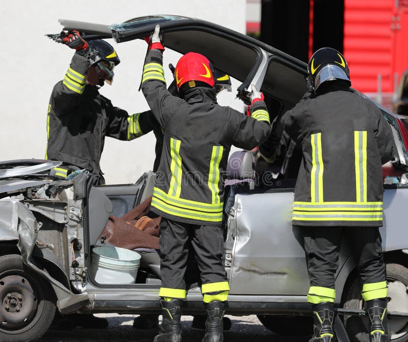 Firefighters Open the Door of the Car with a Pneumatic Shears Editorial ...