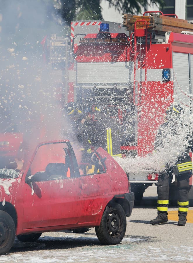 Firefighters Put Out the Fire with Foam Stock Image - Image of fireman ...