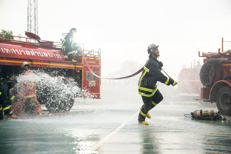 Firefighters Put Out the Fire from the Fire Hose Using a Foam Fire ...