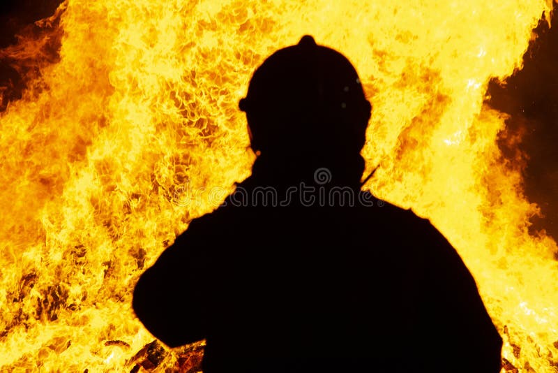 Firefighters Putting Out a Fire. Destruction and Disaster Stock Image ...