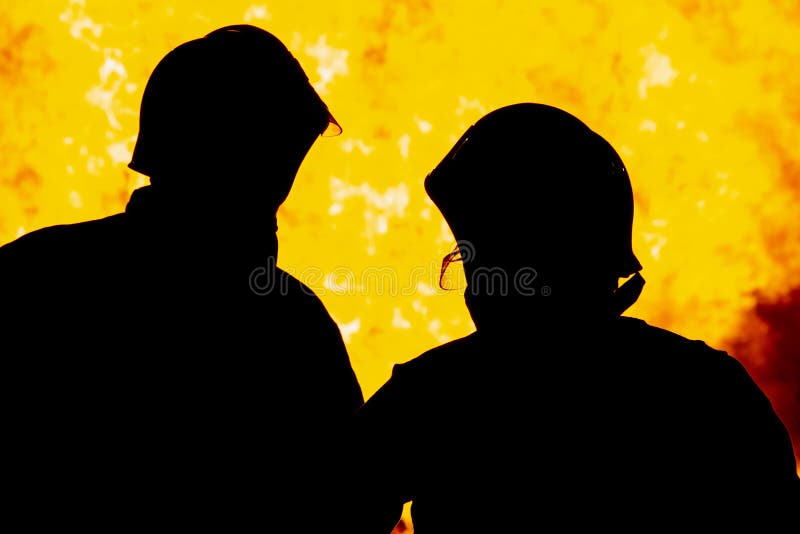 Firefighters Putting Out a Fire. Destruction and Disaster. Global ...