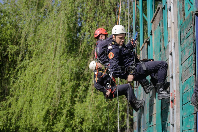 Firefighters are Rappelling and Climbing Ropes Editorial Stock Image ...