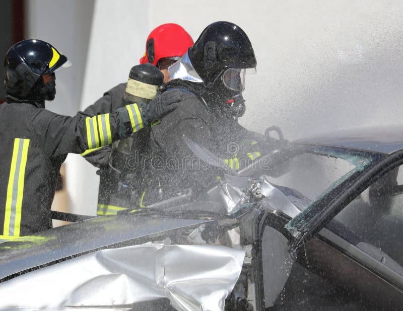 Firefighters during the Rescue Operation after the Road Accident Stock ...