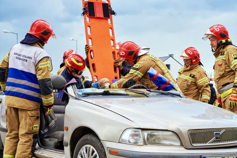 Firefighters during a Rescue Operation Training in Broken Car Editorial ...