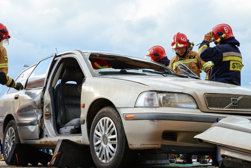 Firefighters during a Rescue Operation Training in Broken Car Editorial ...