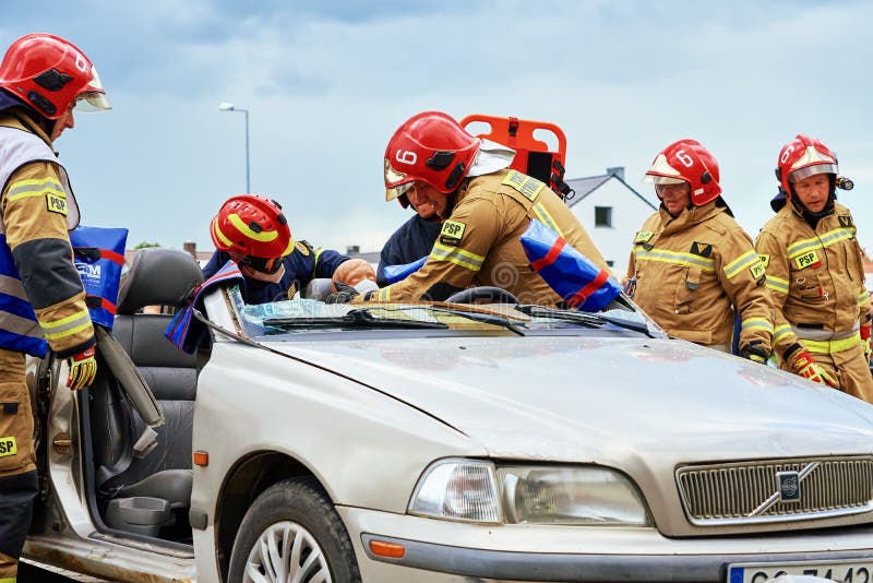 Firefighters during a Rescue Operation Training in Broken Car Editorial ...