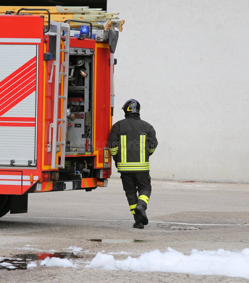 Firefighters Rushing and Fire Engine Stock Image - Image of fire ...