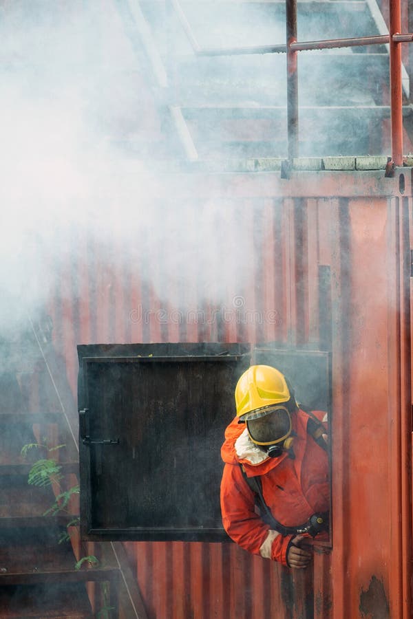 The Firefighters are Showing Their Face. Out of the Building through ...