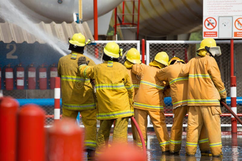 Firefighters Spray Water in Fire Extinguishers Caused by Explosive Gas ...