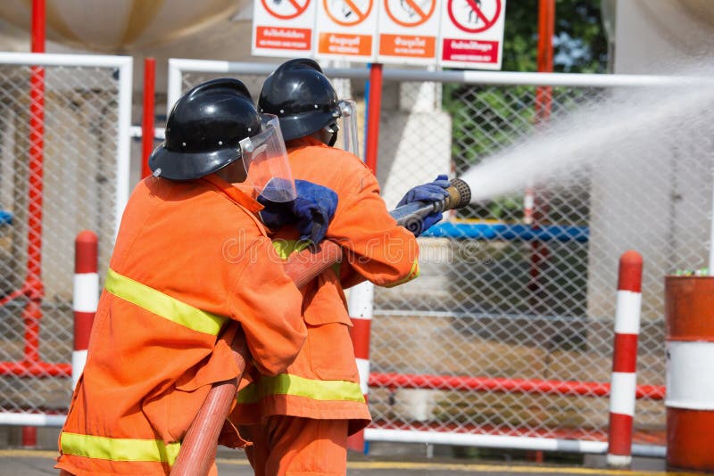 Firefighters Spray Water in Fire Extinguishers Caused by Explosive Gas ...
