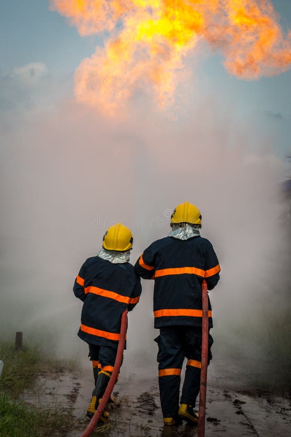 Firefighters in Action ,Firefighters Training Stock Image - Image of ...