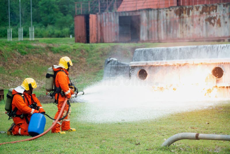 Firefighters Spraying Water To Put Out a Brutal Fire on the Truck ...