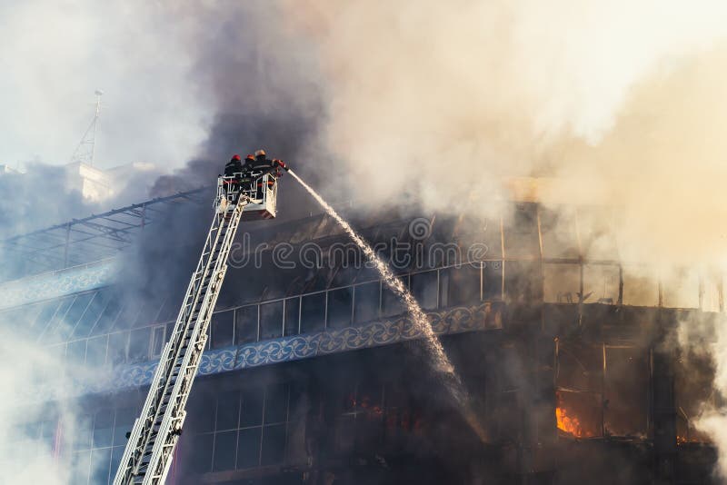 Firefighters on Stairs Extinguish a Big Fire Stock Image - Image of ...