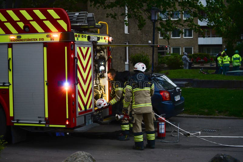 Firefighters in Sweden stock image. Image of hoses, roadway - 94151815