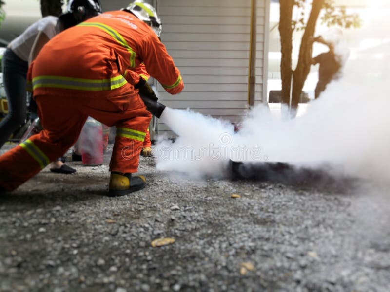 Firefighters are Teaching Fire Extinguishing. Stock Photo - Image of ...