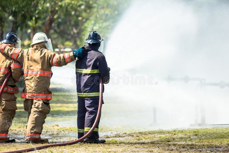 Firefighters are Training for Fighting. Stock Photo - Image of fire ...