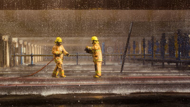 Firefighters Training, Foreground is Drop of Water Springer Stock Photo ...