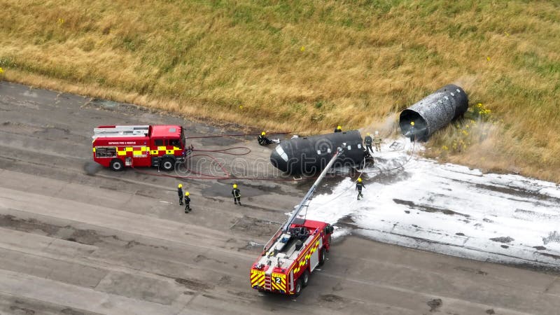 Firefighters Training To Tackle a Fire of a Dummy Aircraft Stock ...