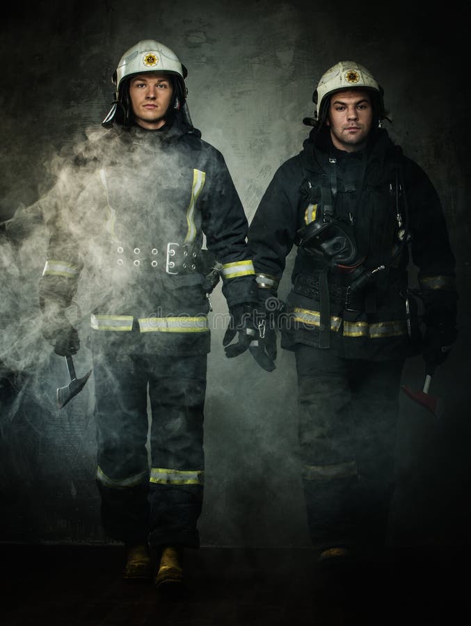 Two Firefighters Fighting a Fire Stock Image - Image of protective ...
